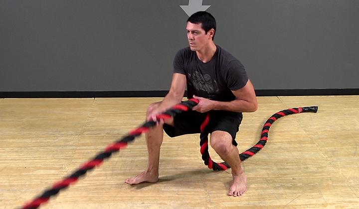 Battle Rope Exercise: Anchored Squat Stance Traveling Row | Onnit Academy